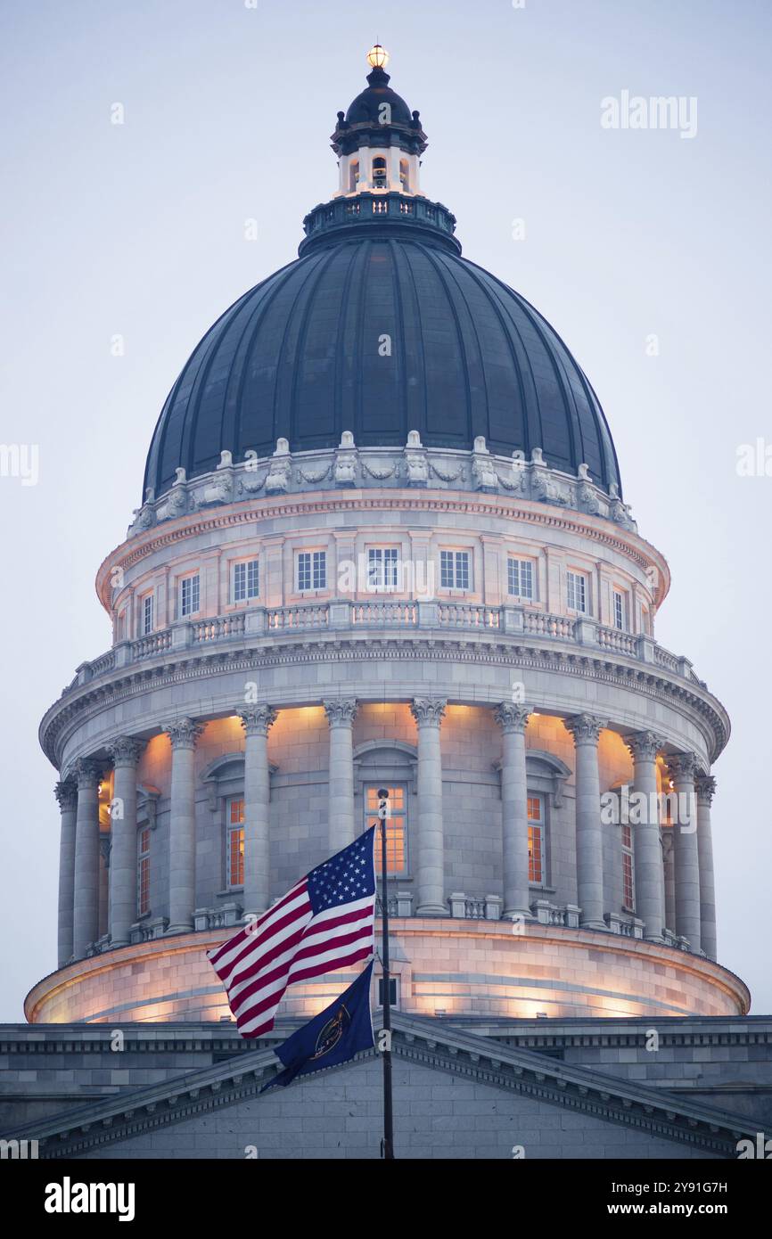 The US and Utah Flags fly in front of the State Capital in Salt Lake ...