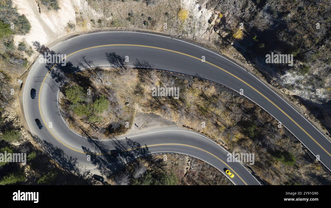 Traffic slows to handle the twists and turns on this curvy two lane ...