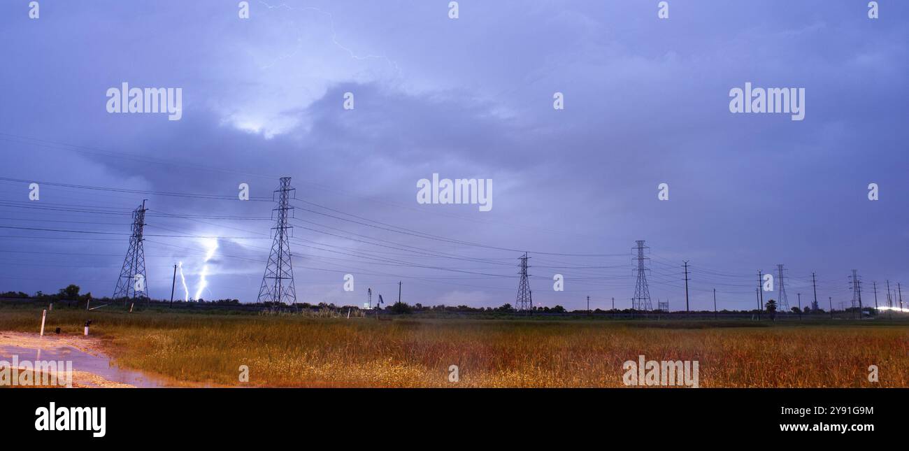 Lightning strikes behind power lines near Galveston Texas Stock Photo ...