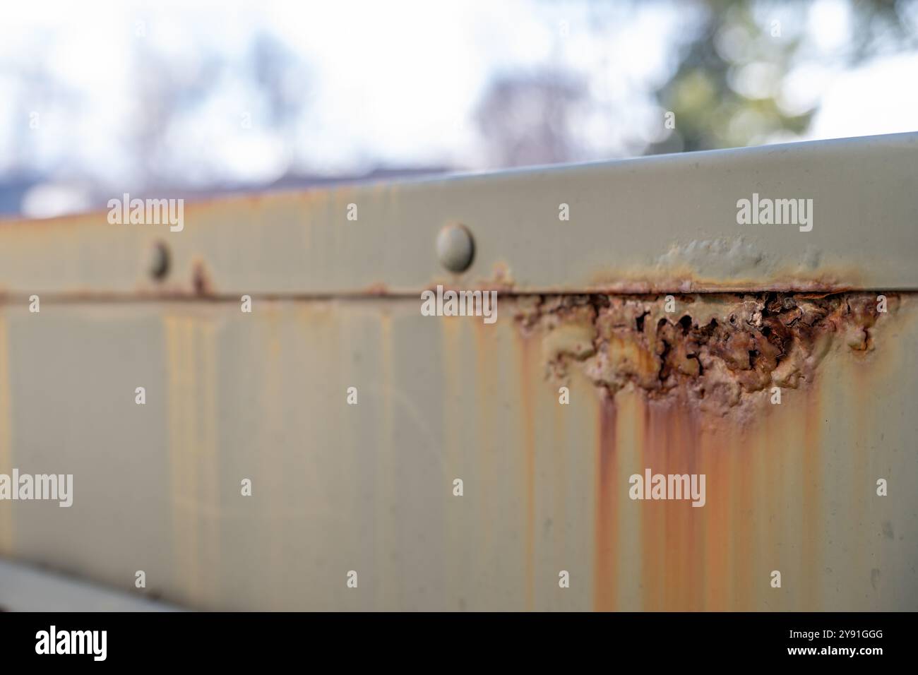Rusted and peeling paint on an electrical transformer exposed to the ...