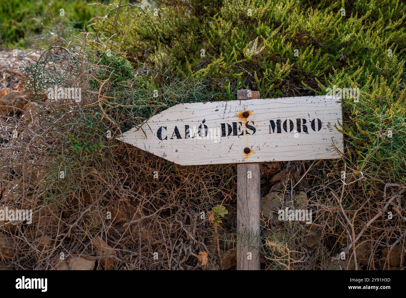 Calo des Moro Beach Mallorca sign made of wood pointing in the ...