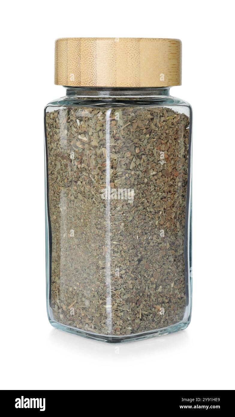 Dry basil in glass jar isolated on white Stock Photo - Alamy