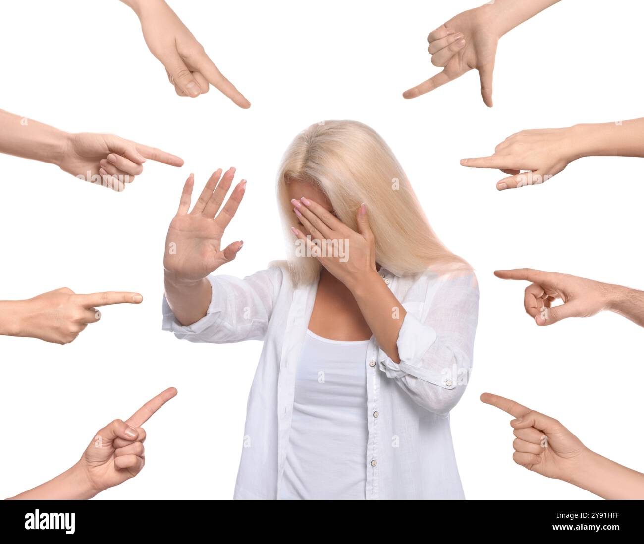 People pointing at embarrassed woman on white background Stock Photo ...