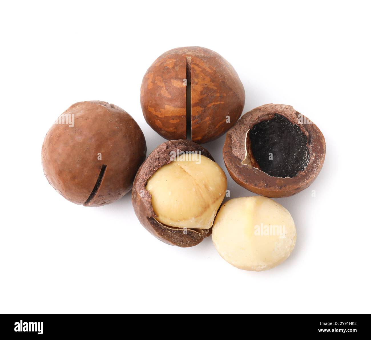 Macadamia nuts with shells isolated on white, top view Stock Photo - Alamy