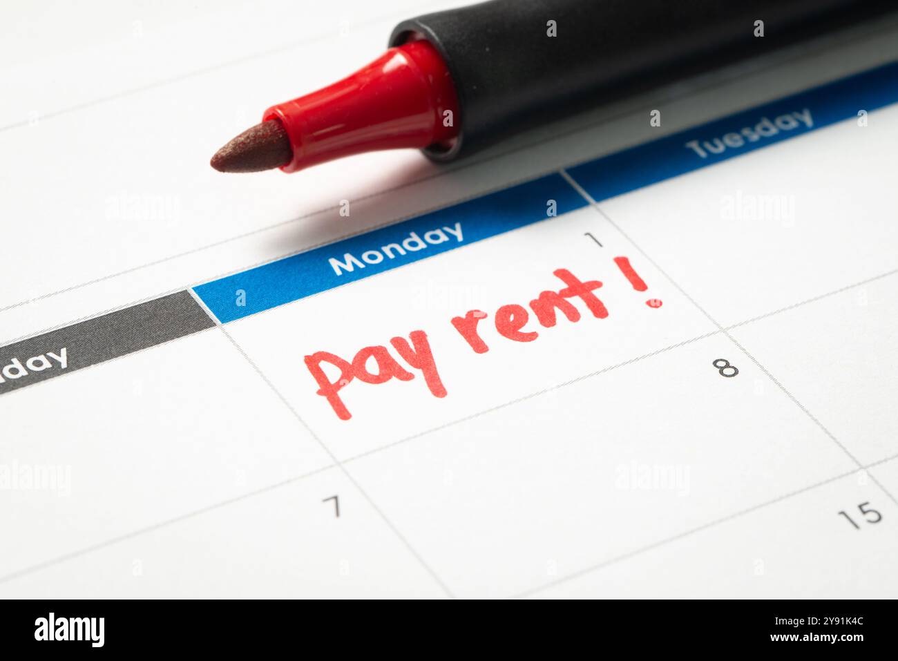 Pay rent reminder written on calendar Stock Photo - Alamy