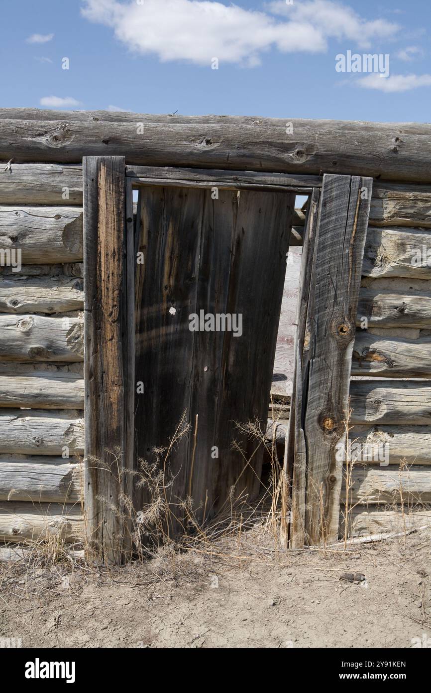 Rotting log cabin shows the effects of neglect. The homestead was ...