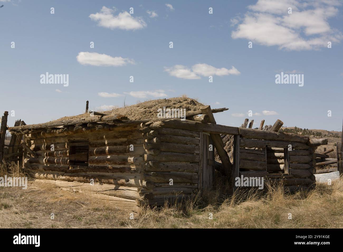 Collapsing sod roofs, falling pole corrals on abandoned homestead ...