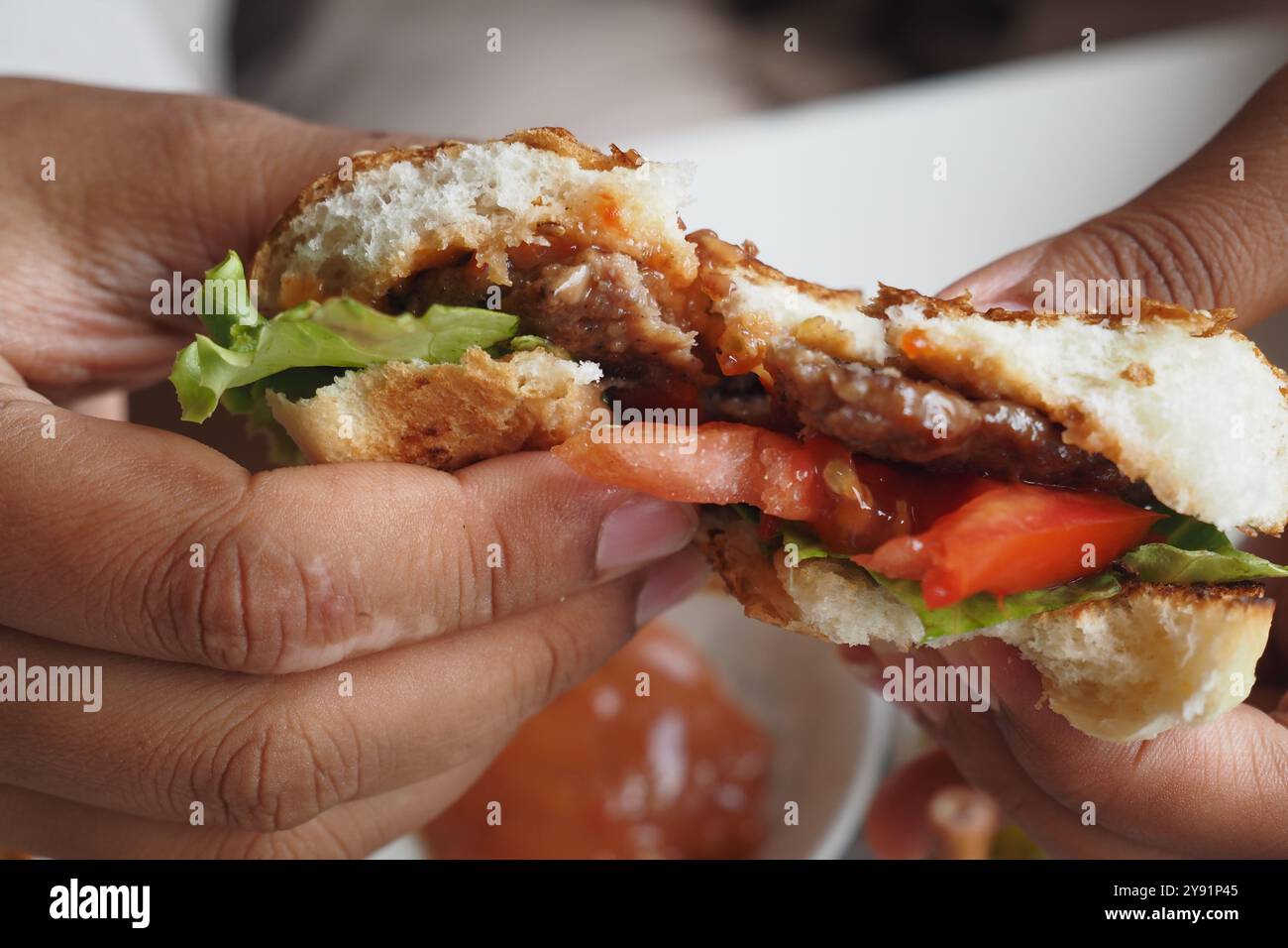 Enjoy a delicious crispy fried chicken sandwich served with fresh and ...