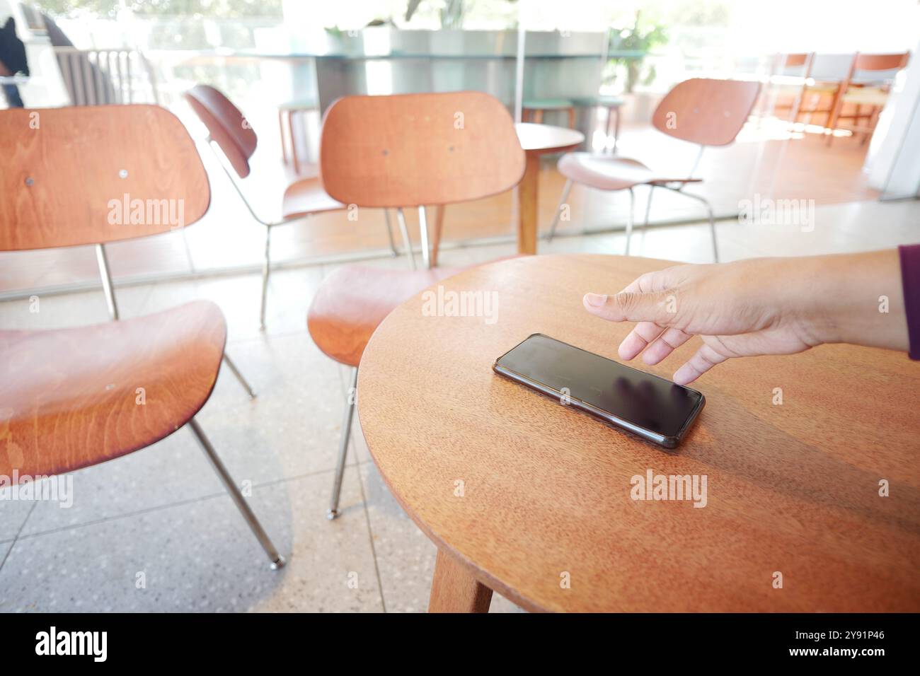 hand picking up smart phone mobile to receive a call Stock Photo - Alamy
