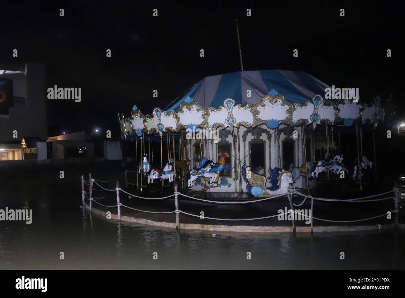 Rain from Hurricane Milton floods a carousel in Progreso, Yucatan state ...