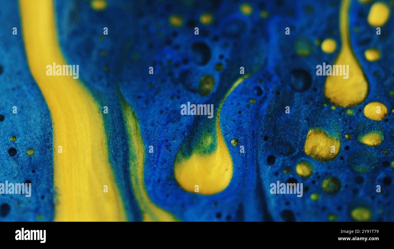 Sparkling ink drop. Art oil leak. Blur vibrant dark blue golden color ...