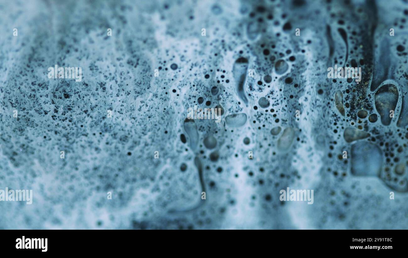 Ink bubble drip. Art oil spill. Defocused blue black wet paint foam ...