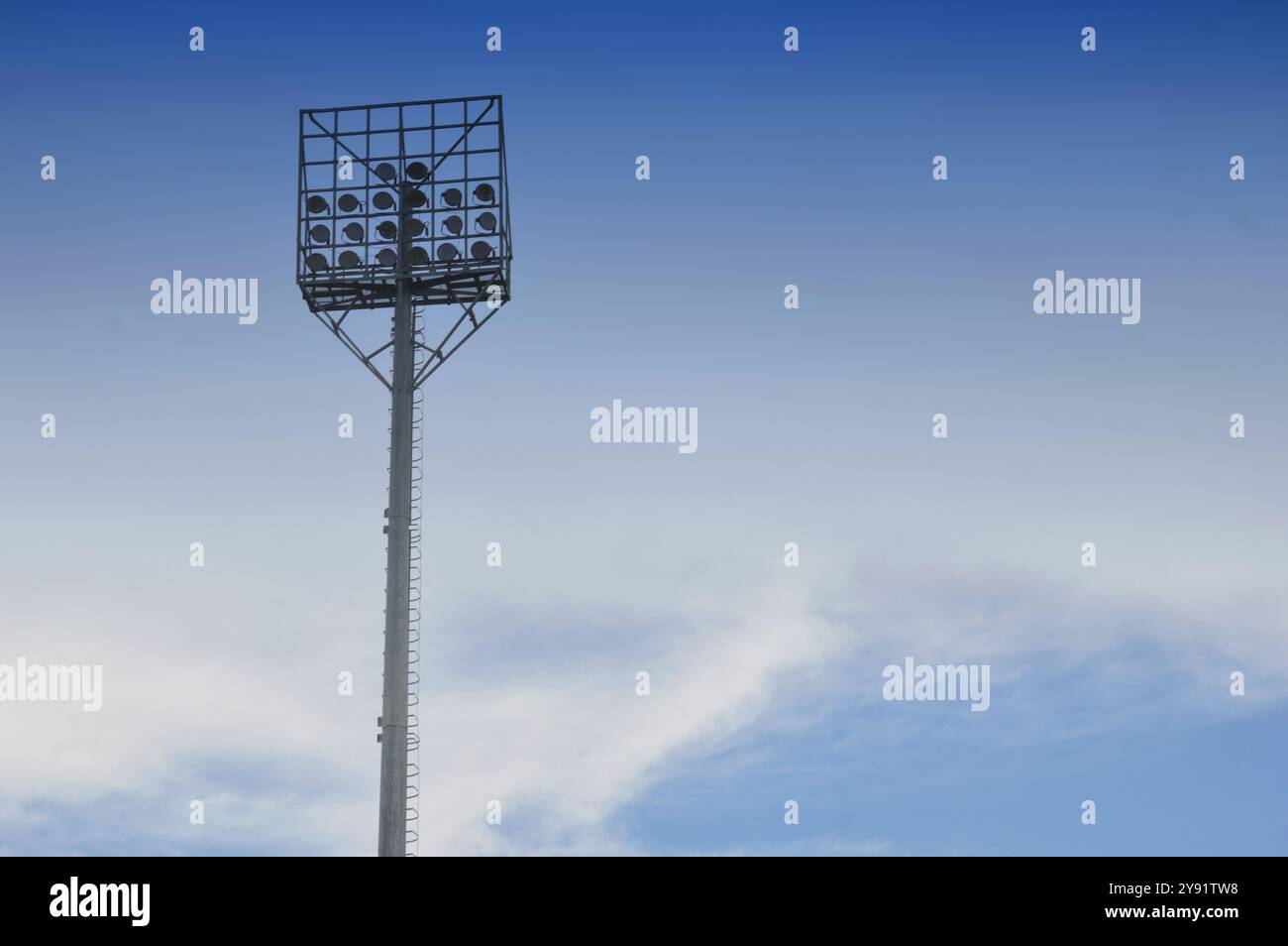 stadium light poles with white clouds and blue sky backgrounds Stock ...