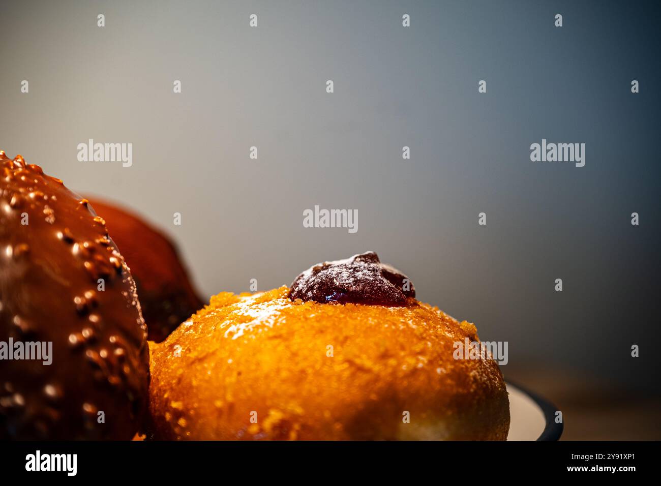 Donuts: jam donuts, donut with chocolate powder spread on top, donut ...