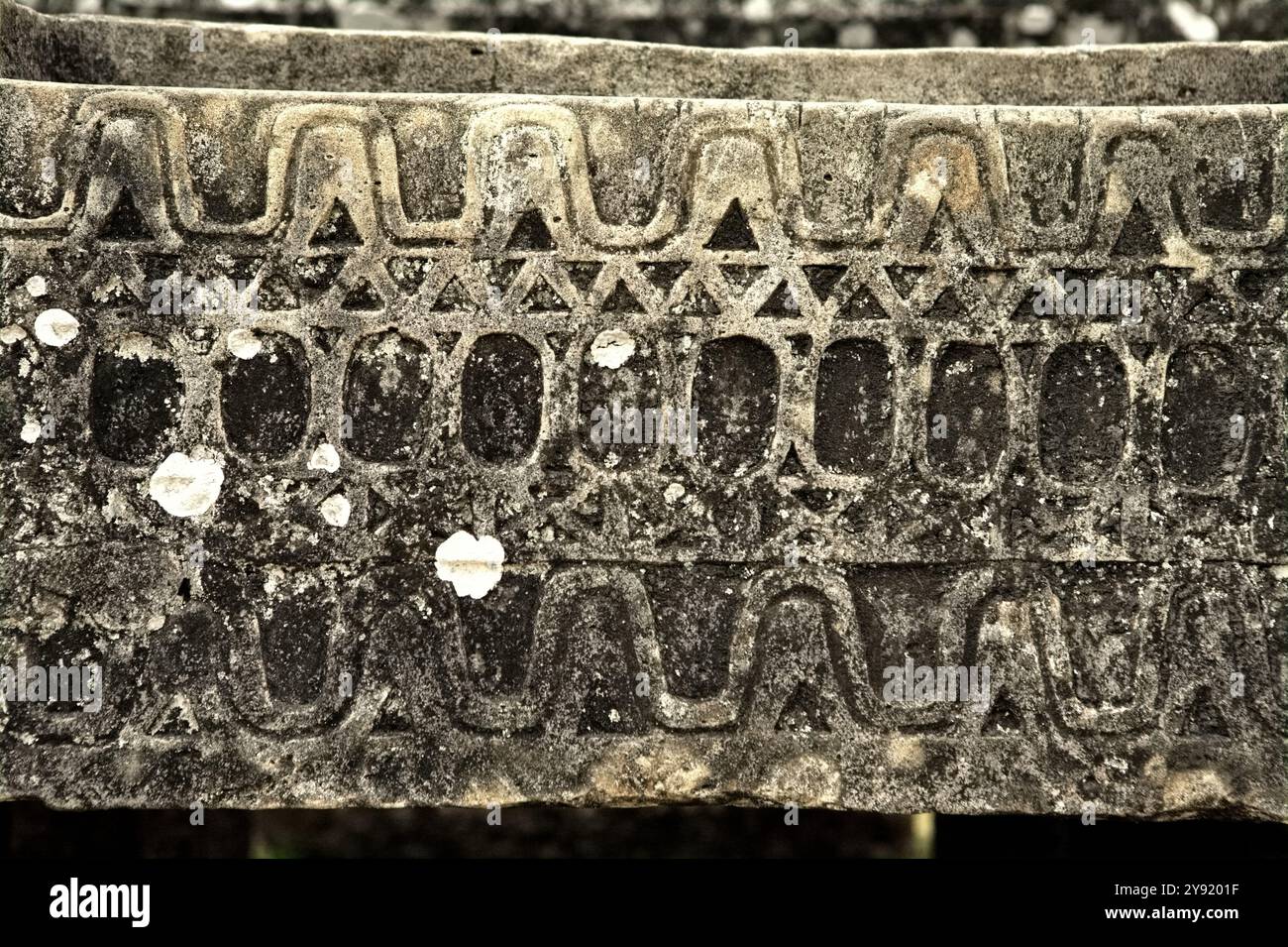 Megalithic carving on a tomb in traditional village of Pasunga in ...