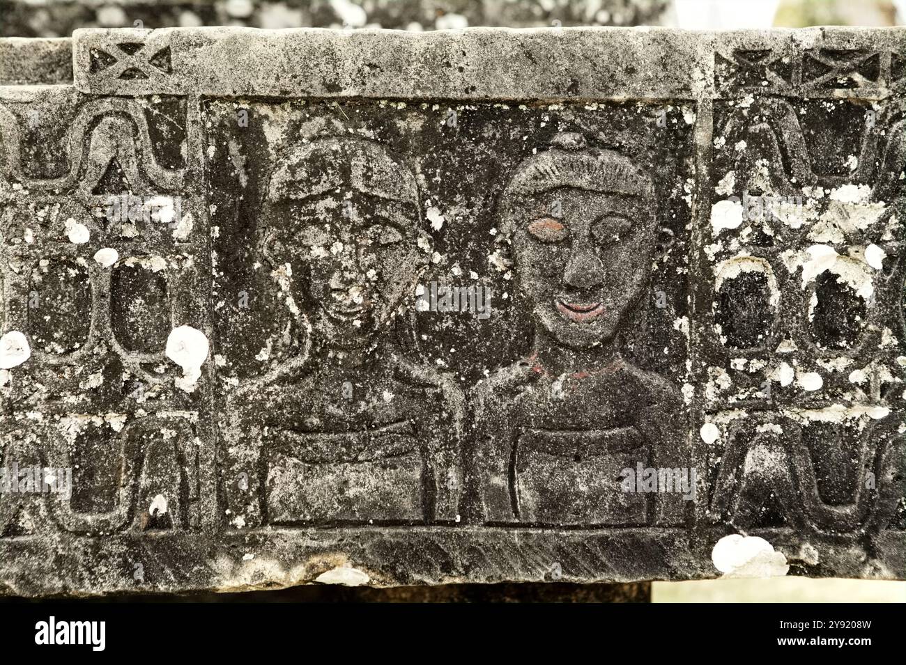 Megalithic carving on a tomb in traditional village of Pasunga in ...