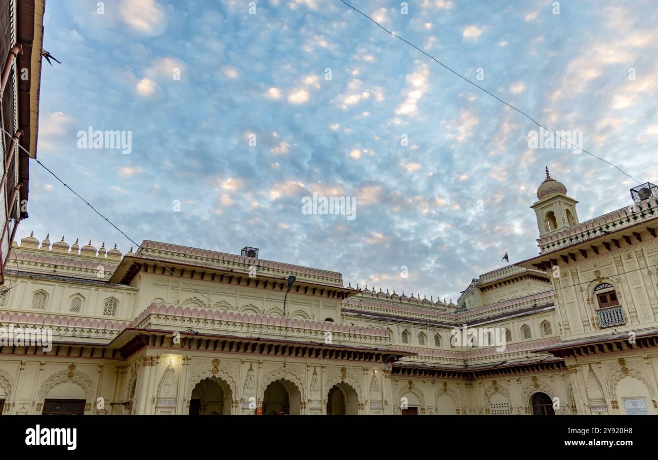 Sacred Hindu temple with its vibrant architecture and dramatic sky at ...