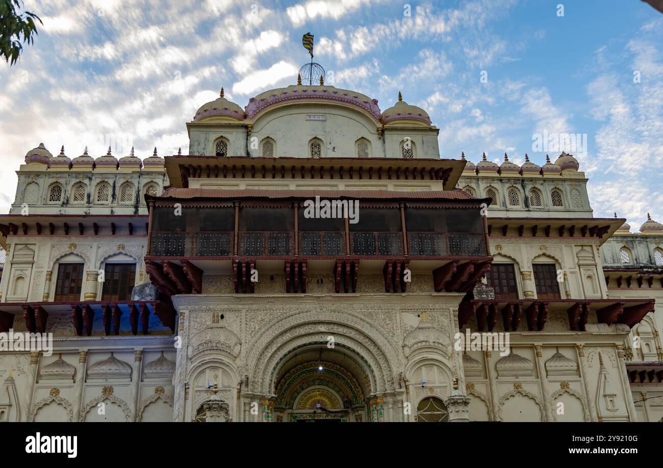 Sacred Hindu temple with its vibrant architecture and dramatic sky at ...