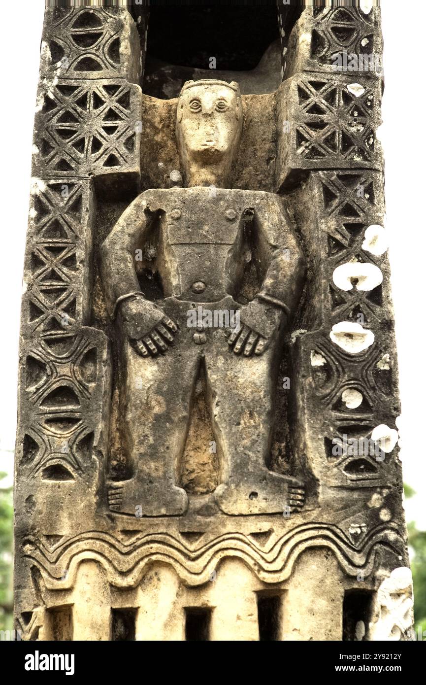 Megalithic carving on a tomb in traditional village of Pasunga in ...