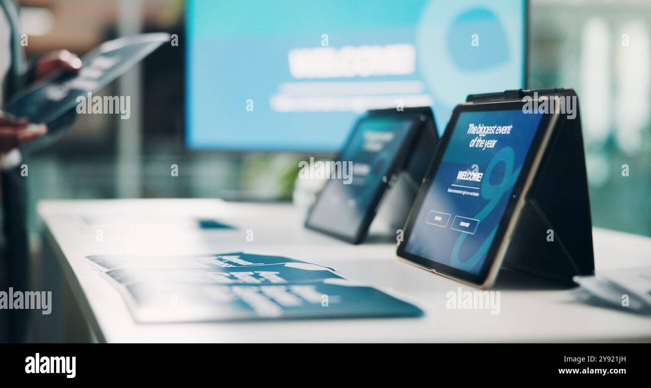 Welcome booth, conference and tablet at expo for summit, information or showcase. Product ...