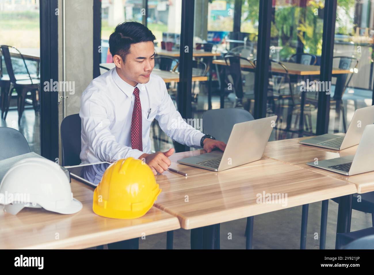 Civil construction engineer working with laptop at desk office with ...