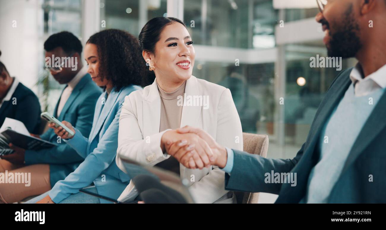 Woman, handshake and introduction at trade show, training or event ...