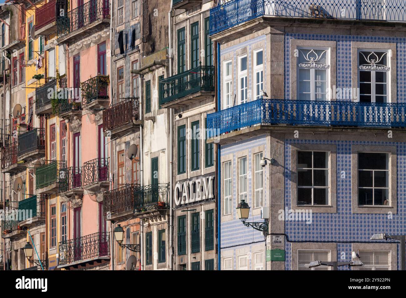 The famous riverside buildings in Porto. Colorful facades with colored ...