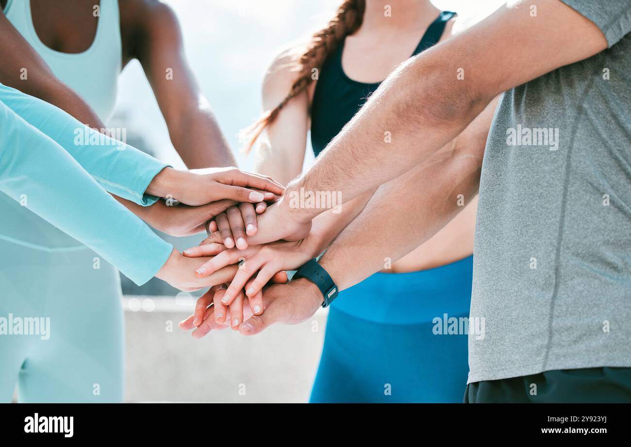 Fitness, group and hands together in city with exercise, motivation and ...