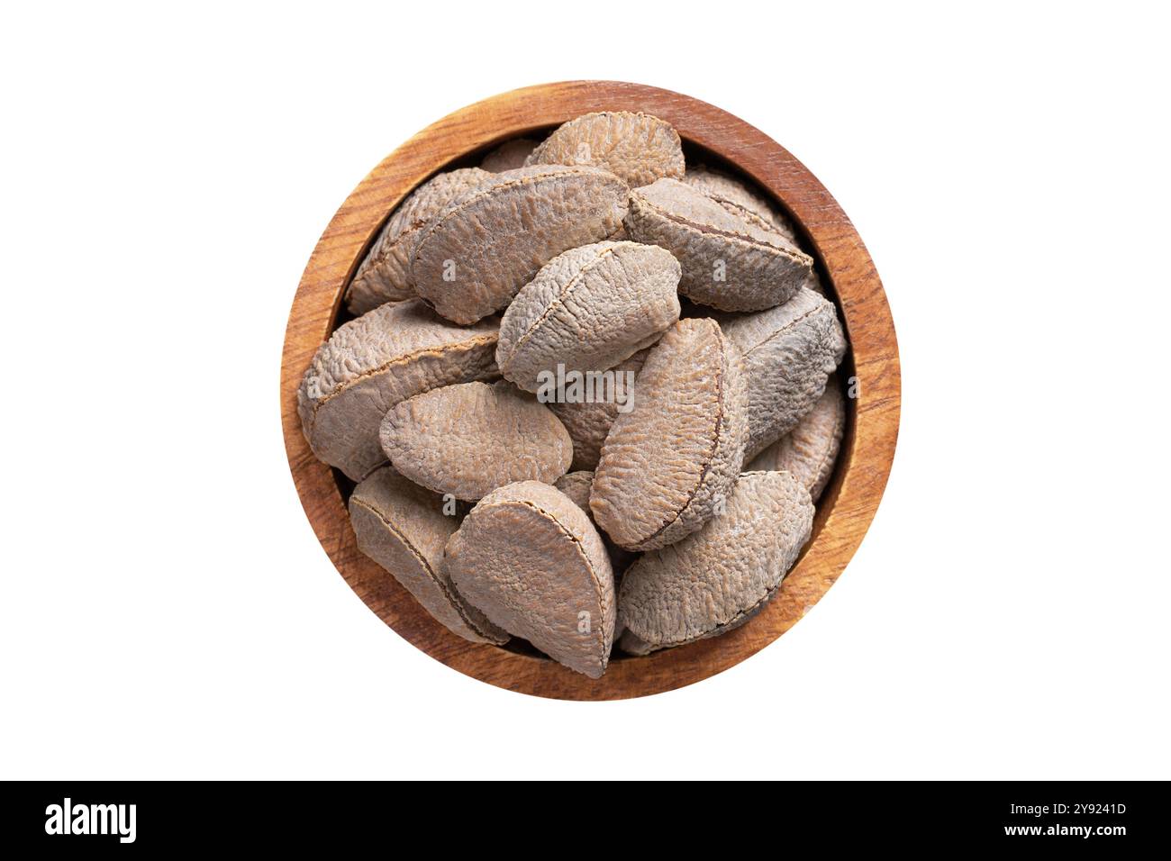 shelled bertholletia, brazil nuts in wooden bowl isolated on white ...