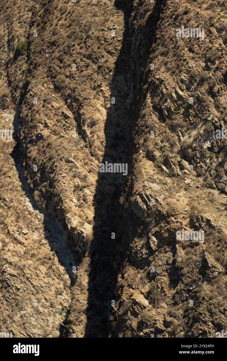 detail of Eastern Sierra mountain hillside show ridges, depth, texture ...