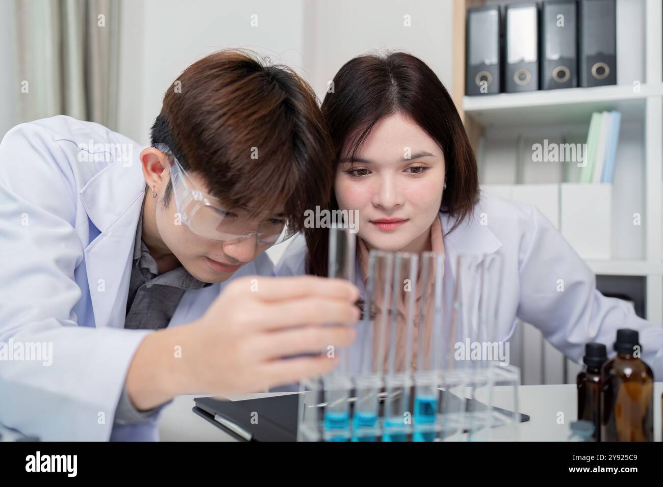 Young Scientists Engaged in Test Tube Experiments for Innovative ...