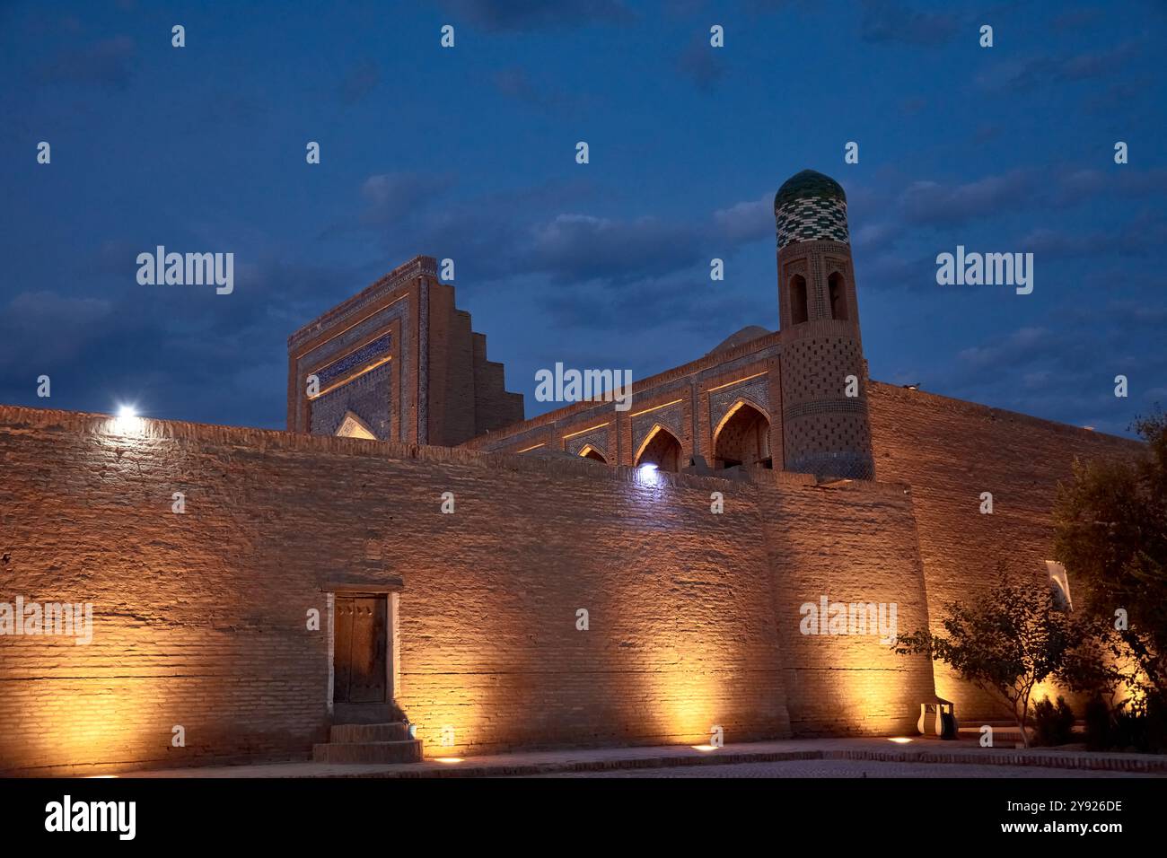 The beautifully illuminated historic architecture of Itchan Kala, the inner city of Khiva ...