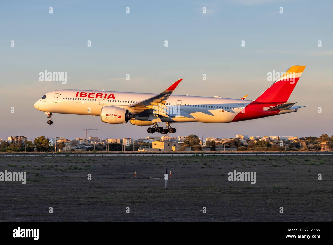 Iberia Airbus A350-941 (REG: EC-NMZ) arriving just before sunset for ...