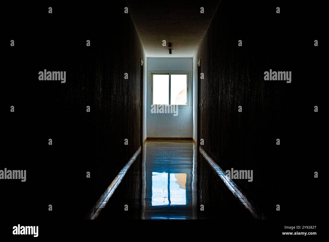 colored reflection of a window in backlight, the dark corridor Stock ...