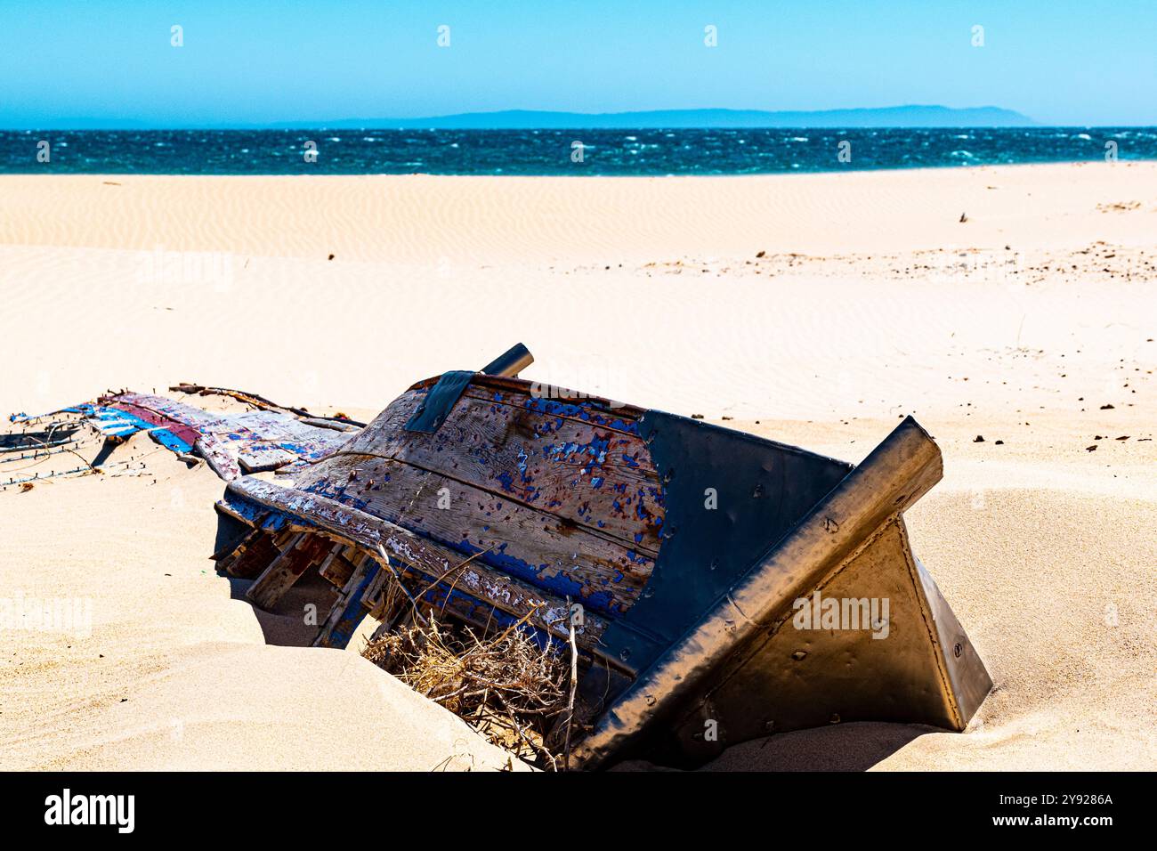 small fishing boat submerged by the sand carried by the wind to Bolonia ...
