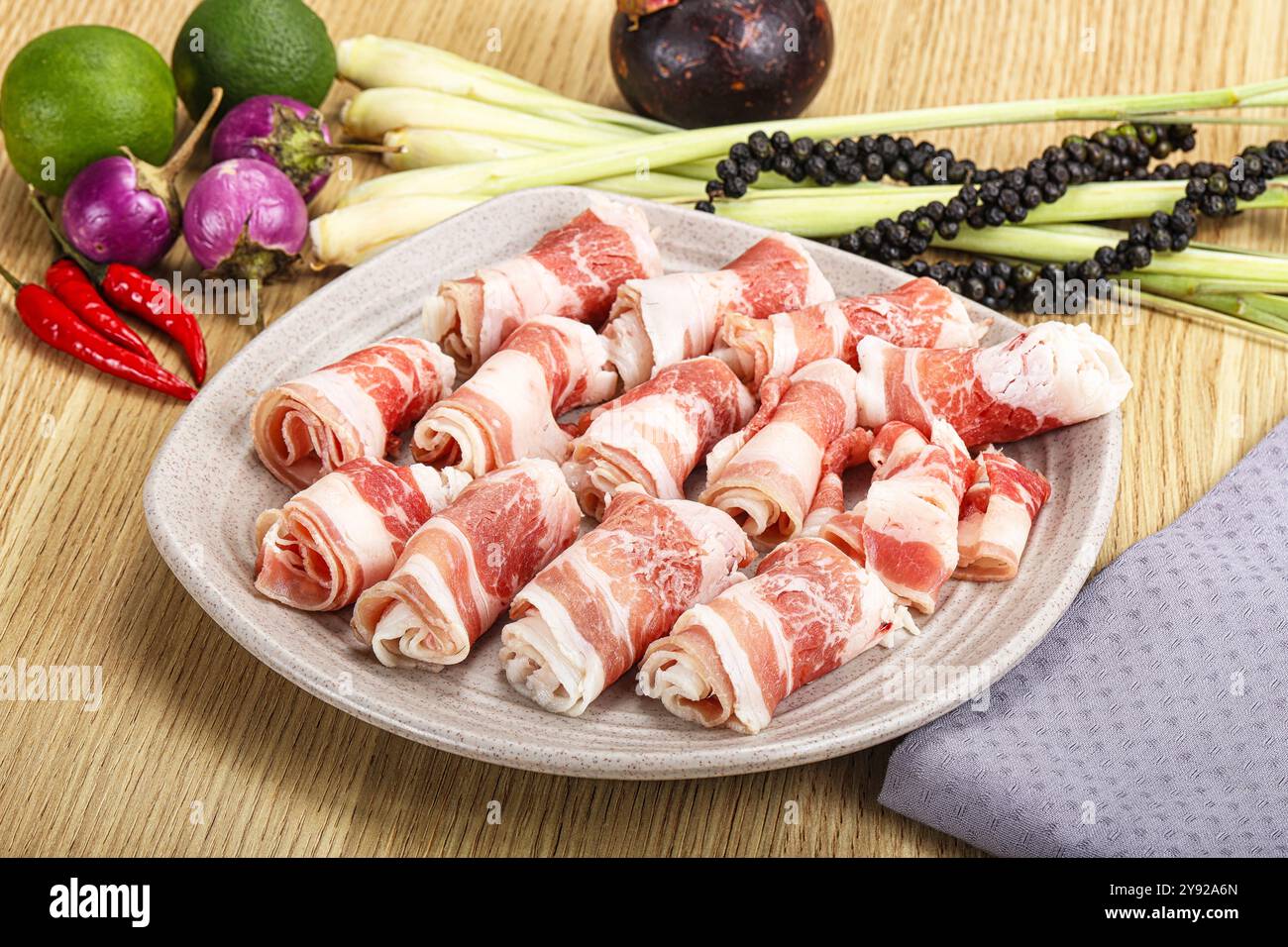 Raw beef bacon roll for grill Stock Photo - Alamy