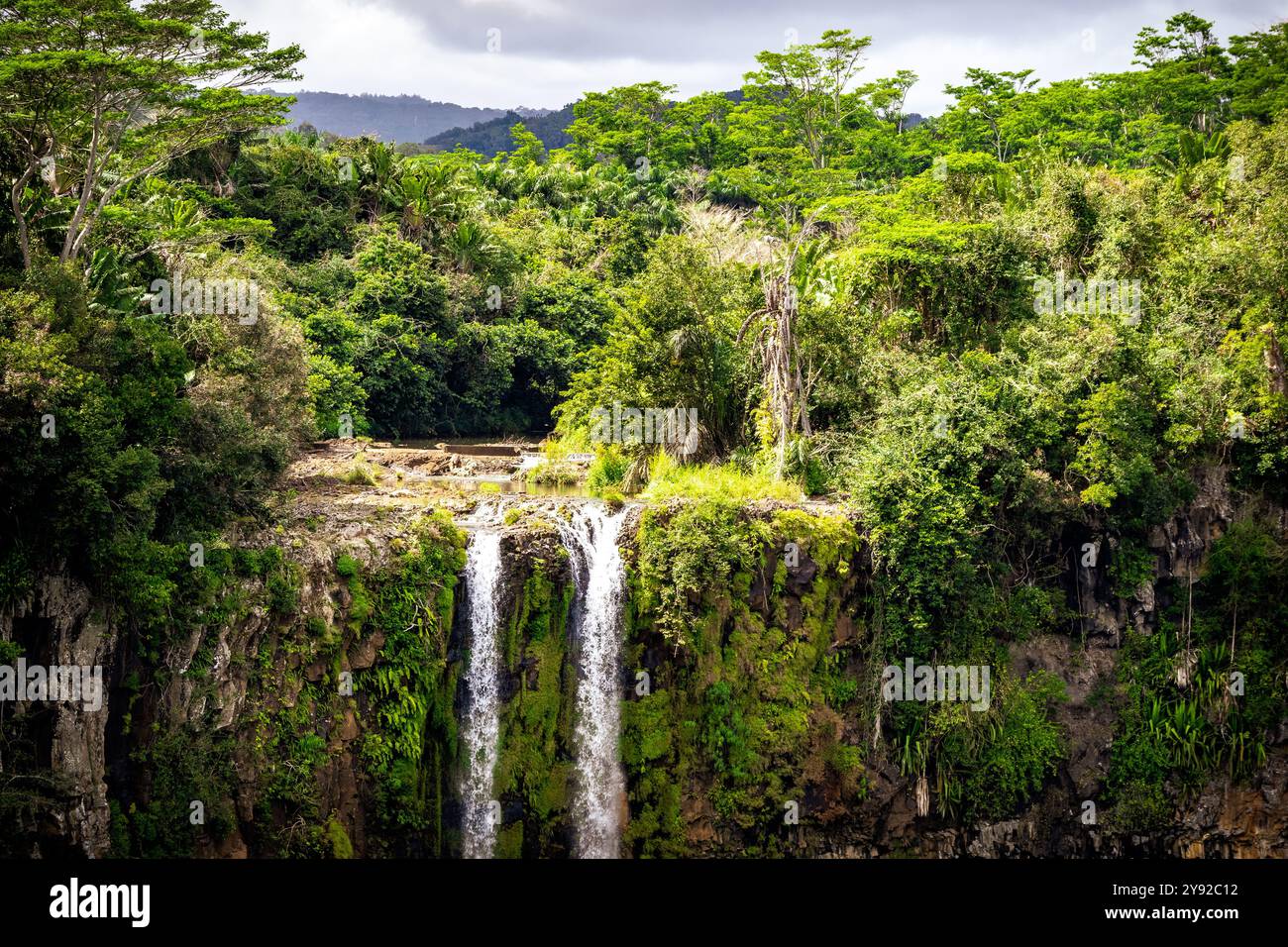 Spectacular view of the Chamarel Falls cascading over the edge of a ...