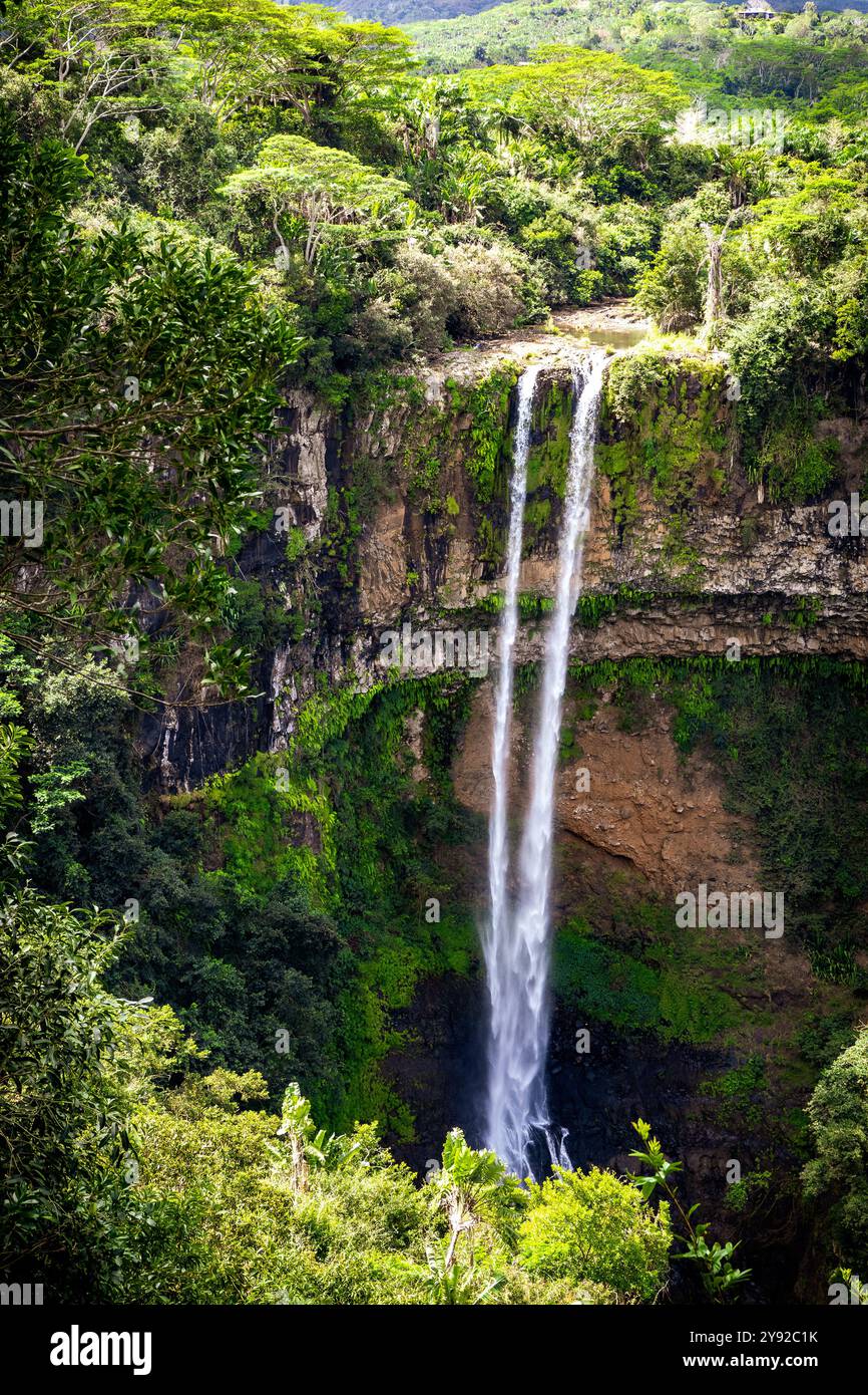 Spectacular view of the Chamarel Falls cascading over the edge of a ...
