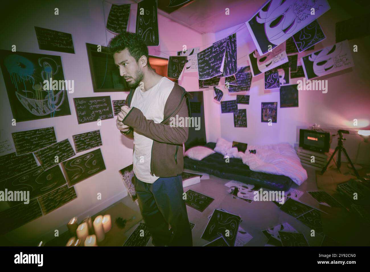 Night, paranoid and man in bedroom, fear and scared with mental health ...