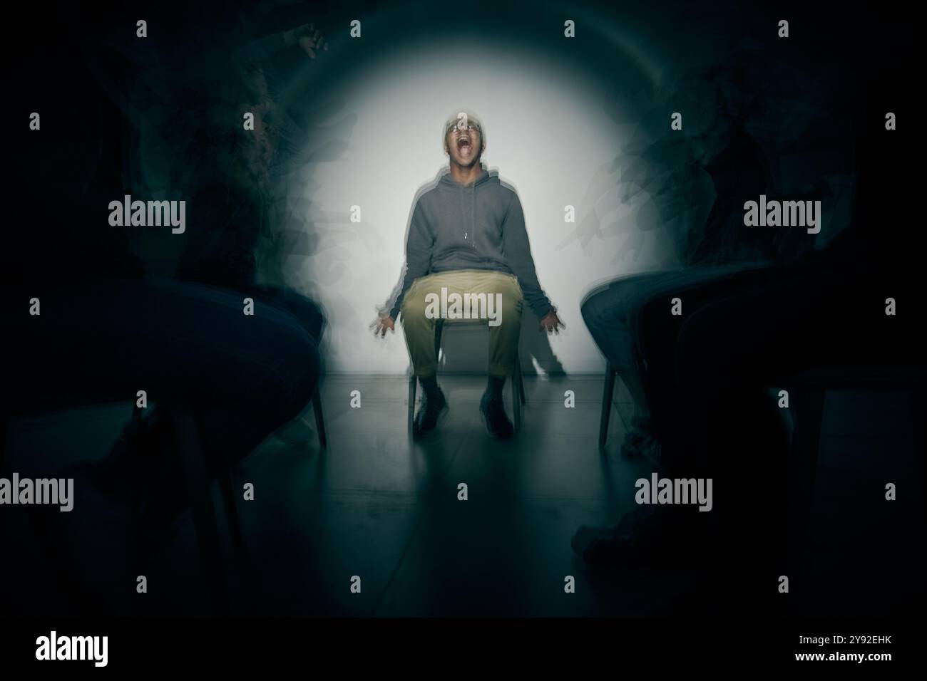 Mental health, psychology and screaming with man in studio on dark ...