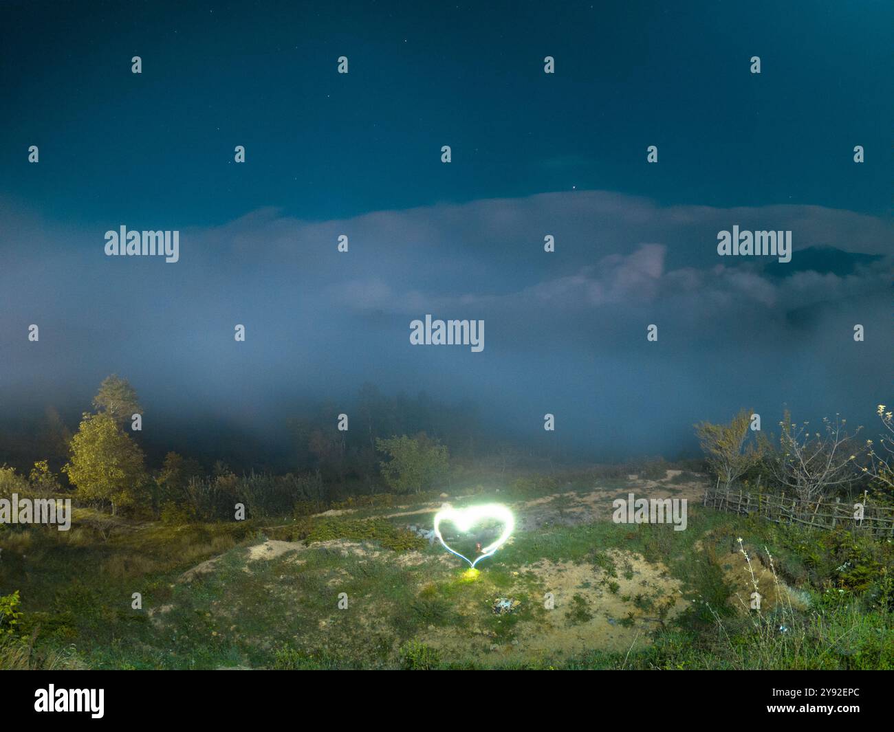 Heart shaped light trail hi-res stock photography and images - Alamy