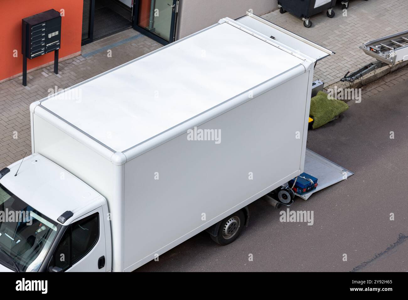 Mover service lifting ladder cargo crane platform vehicle van parked at ...