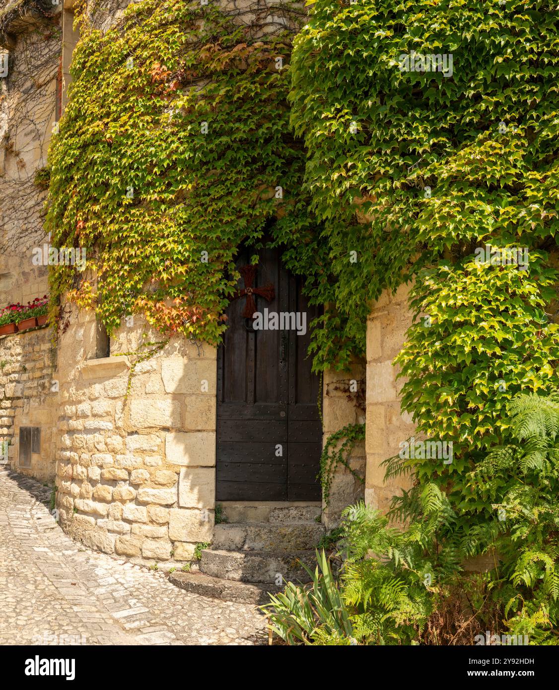 Doorway at the tourist attraction of La Roque-Gageac, on the river ...