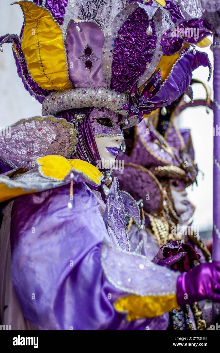 Eye-catching, vivid colour of the masks and exotic costumes on public ...