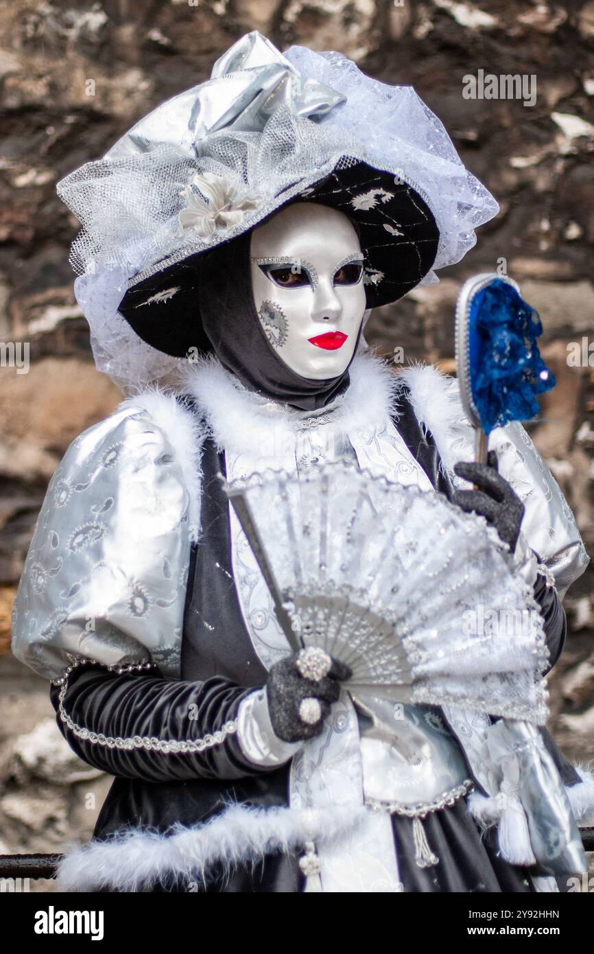 Eye-catching, vivid colour of the masks and exotic costumes on public ...