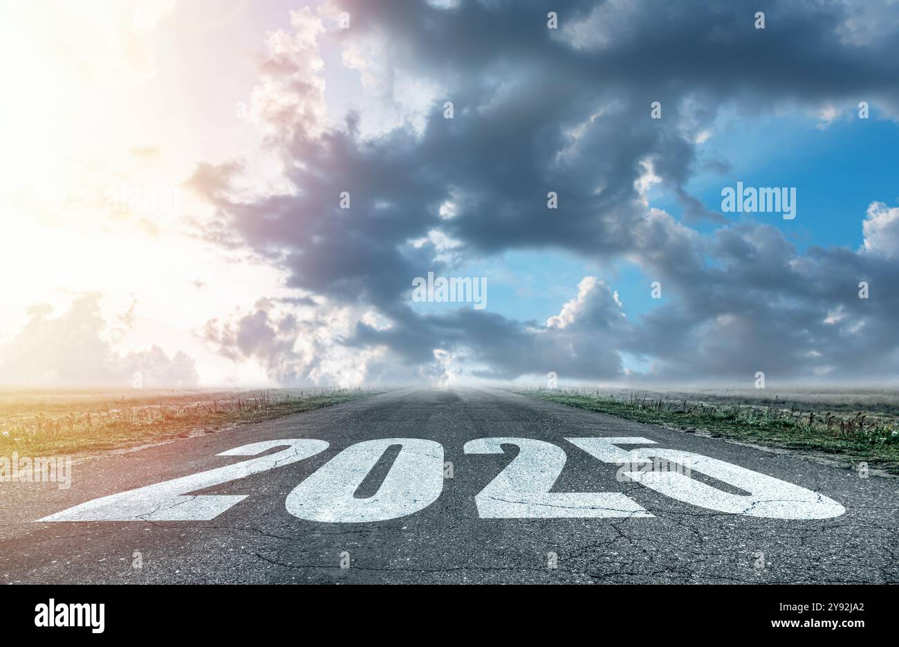 Asphalt road with the number 2025 New Year Stock Photo - Alamy
