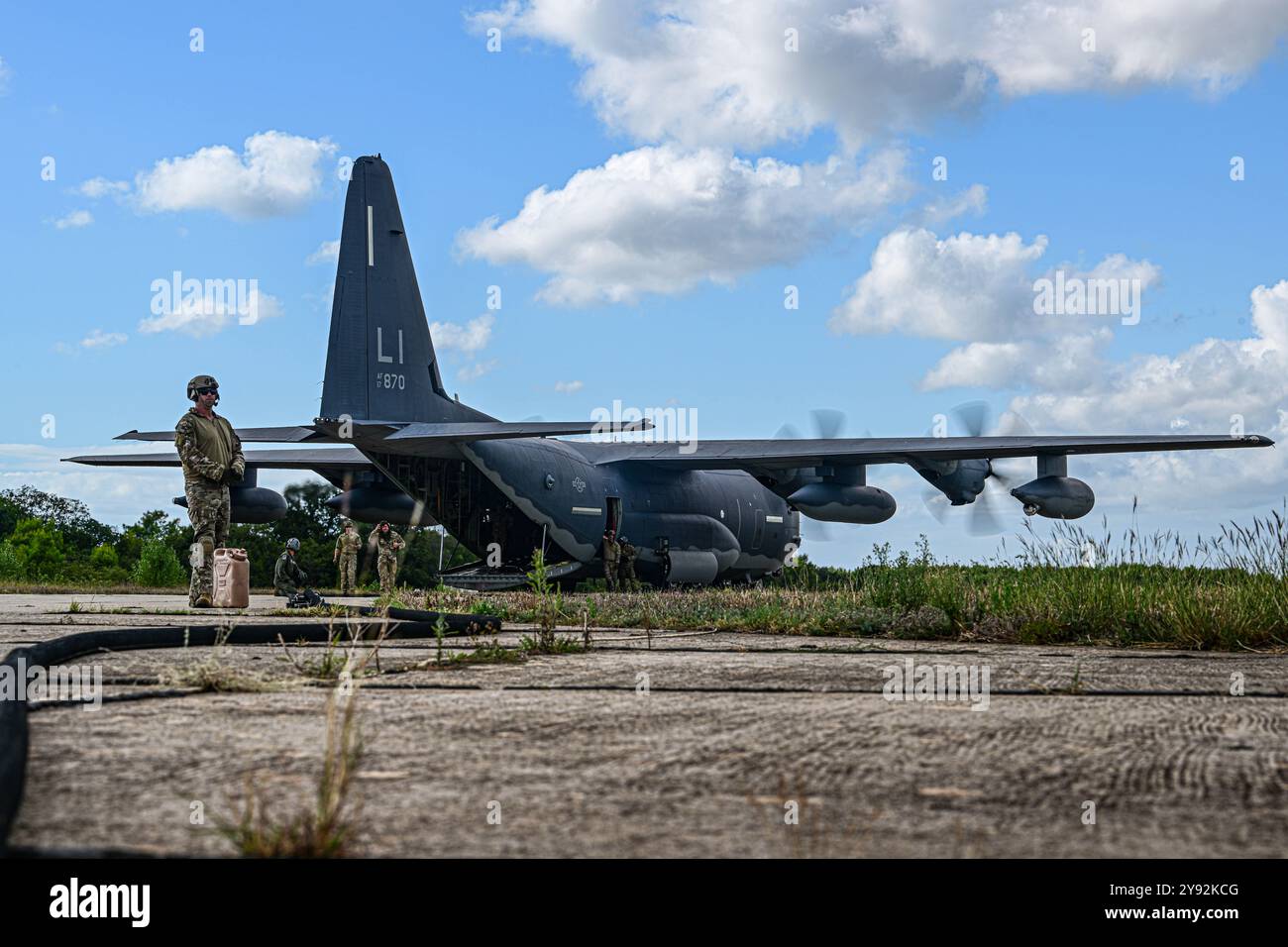 U.S. Air Force Airmen, assigned to the 102nd Rescue Squadron, establish ...