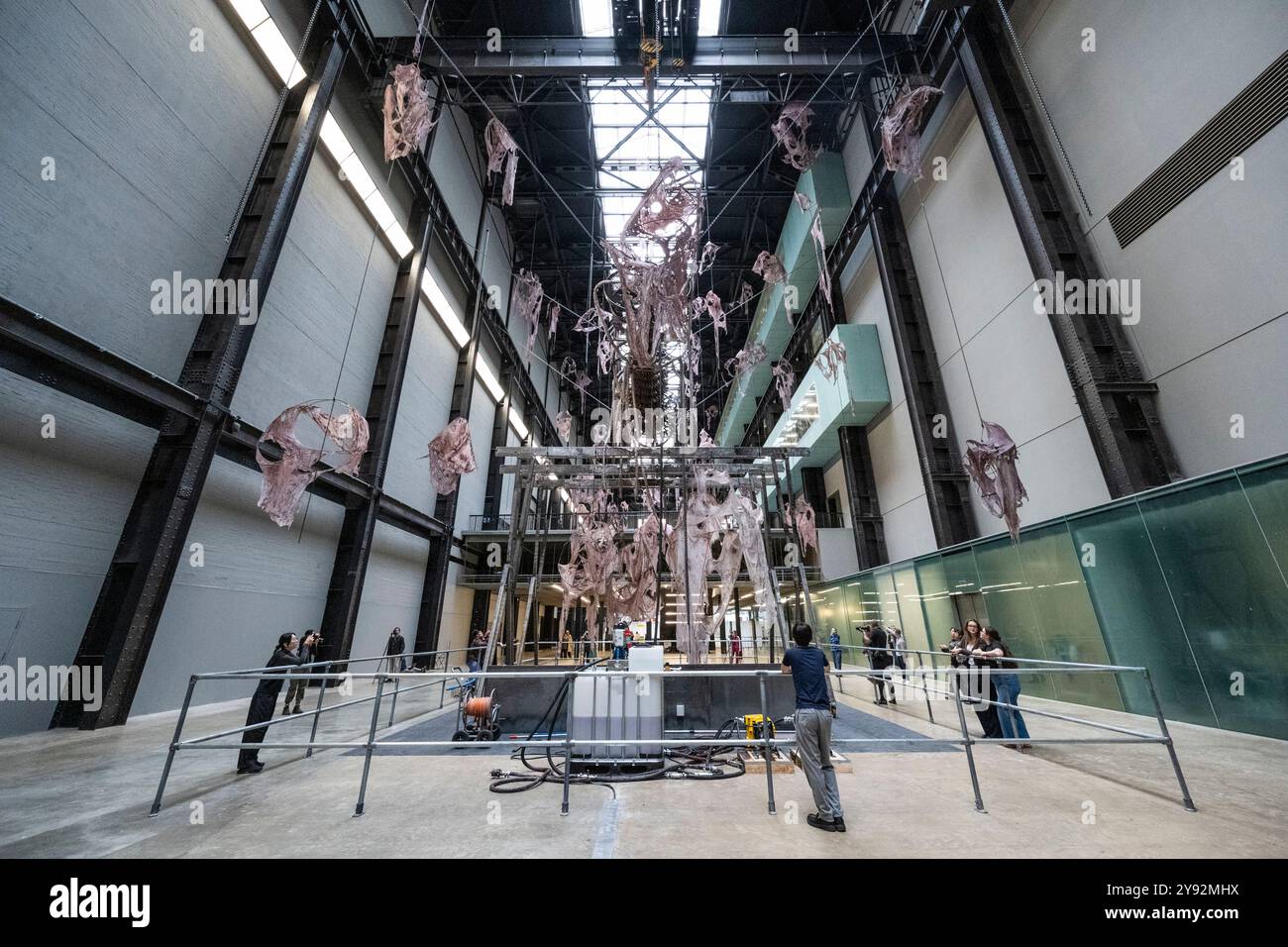 London, UK. 8 October 2024. Staff at the unveiling of ‘Open Wound’ by ...
