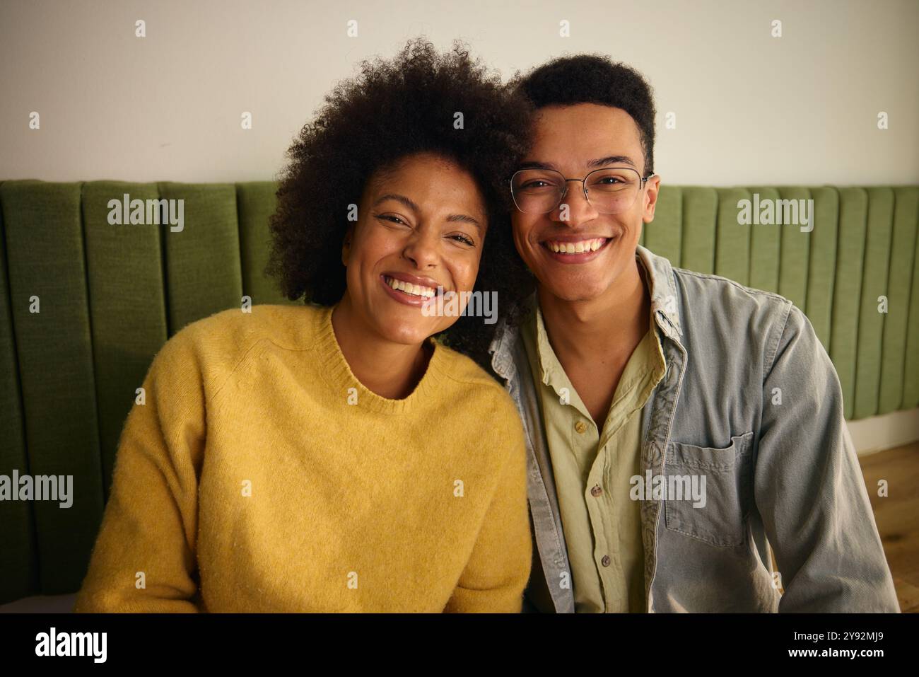 A mixed raced couple taking a photo together Stock Photo - Alamy