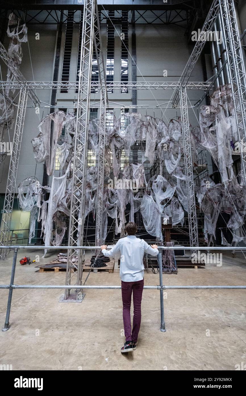 London, UK. 8 October 2024. Staff at the unveiling of ‘Open Wound’ by ...